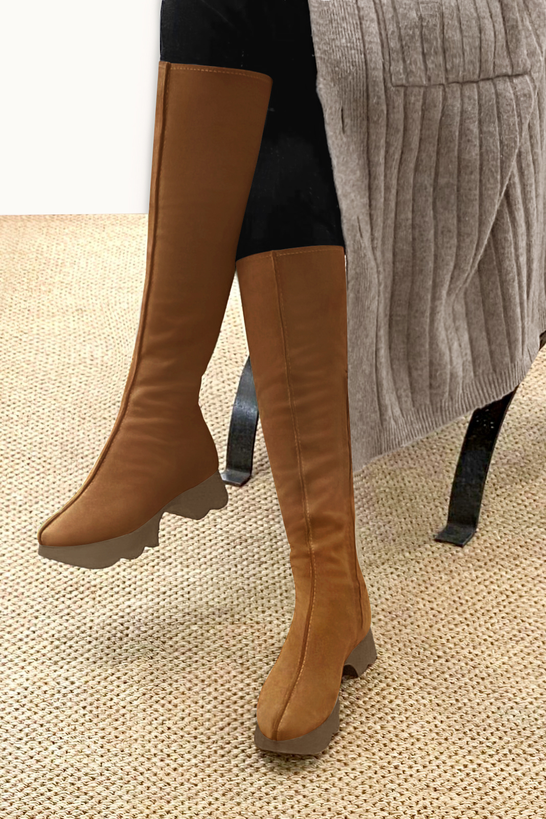 Caramel brown knee-high boots, with laces at the back. Round toe. Low ...